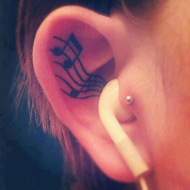 29 Tattoo Design Ideas With Dermal Piercings To Add Glam To Your Ink Yourtango